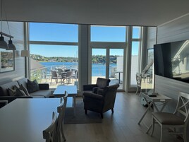 Apartamento superior, vista para o mar | Área de estar