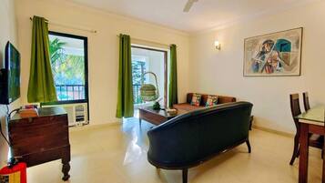 Apartamento, 1 quarto, cozinha, vista para o jardim | Sala de estar