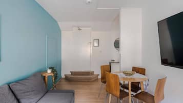 Apartamento, 1 cama de casal e sofá-cama, cozinha, Vista para a cidade (Grafton C) | Sala de estar