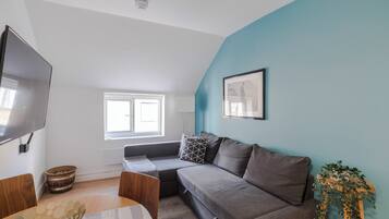 Apartamento, 1 cama de casal e sofá-cama, cozinha, Vista para a cidade (Grafton C) | Sala de estar