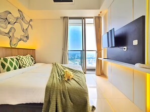 Quarto, 1 quarto, Vista para a cidade | Ferro/tábua de engomar, Wi-fi grátis 