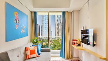 Apartamento, 1 quarto, vista para a cidade | Área de estar | Smart TV 43 polegadas com canais a cabo