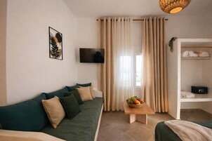Quarto Triplo, varanda | Sala de estar