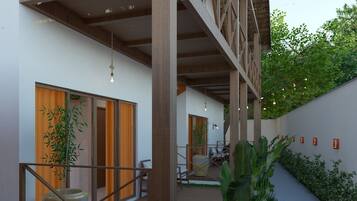 Quarto triplo standard, vista para o jardim | Terraço/pátio