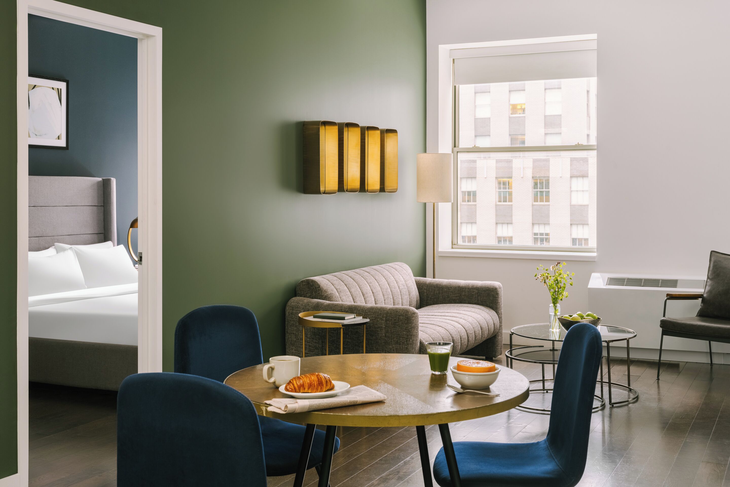 Apartamento Deluxe, várias camas | Sala de estar