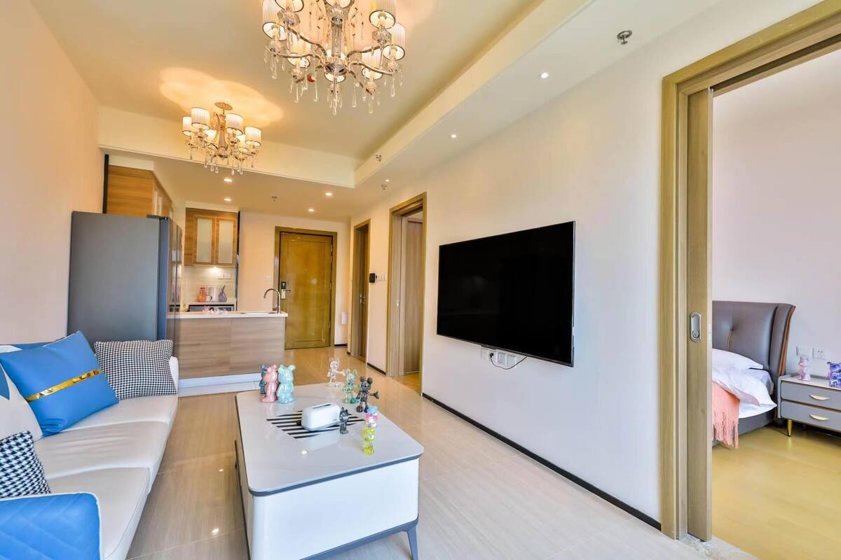 Suíte conforto, vista para a cidade | Sala de estar