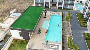 Apartamento em Condomínio Fechado, 1 quarto, acessível, varanda | Piscina | Piscina exterior