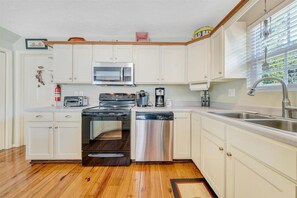 Casa, várias camas, cozinha (LAKE Cape Cottage) | Cozinha privada