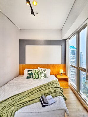 Apartamento, 2 quartos, vista para a cidade | Escrivaninha, ferros/tábuas de passar roupa, Wi-Fi de cortesia