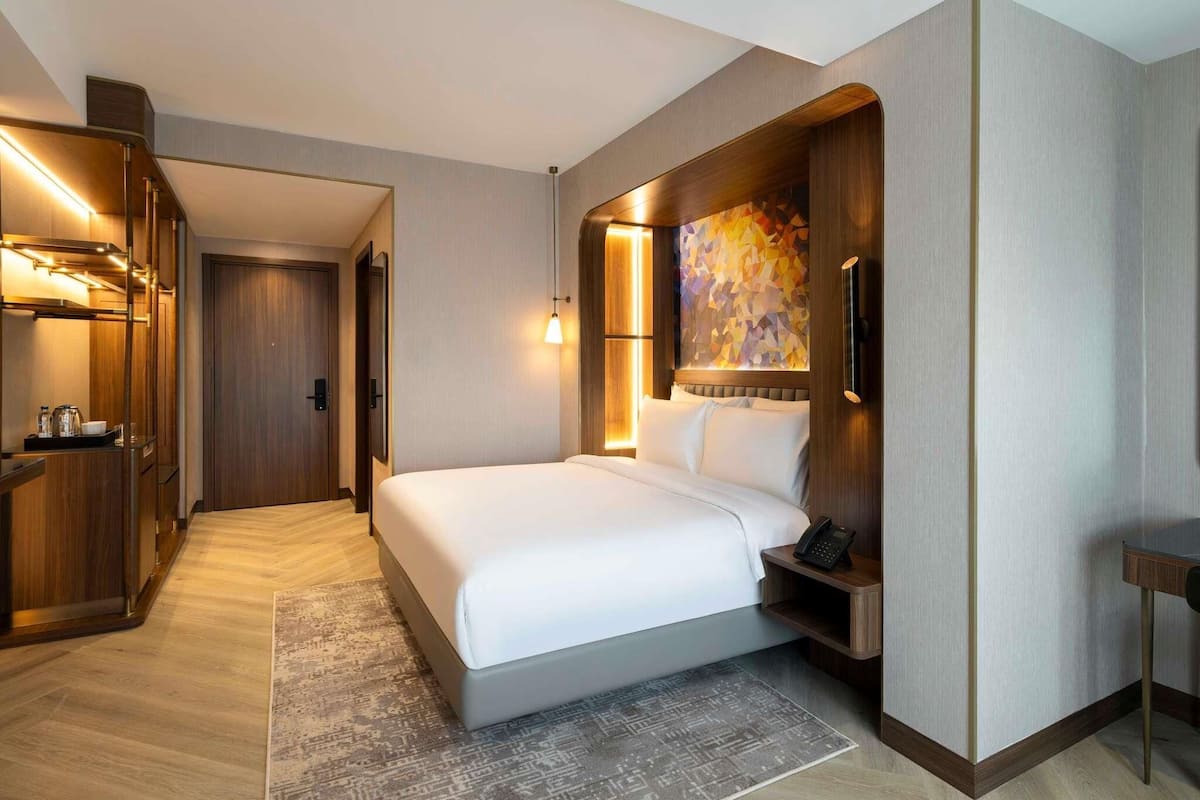 Quarto superior, 1 cama de casal | Frigobar (abastecido com alguns itens grátis), cofres nos quartos