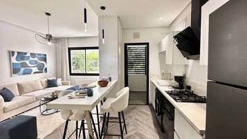 Apartamento, 1 quarto | Sala de jantar