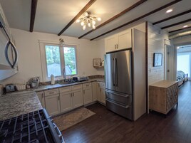 Apartamento Design, pátio, vista para o jardim | Cozinha privada