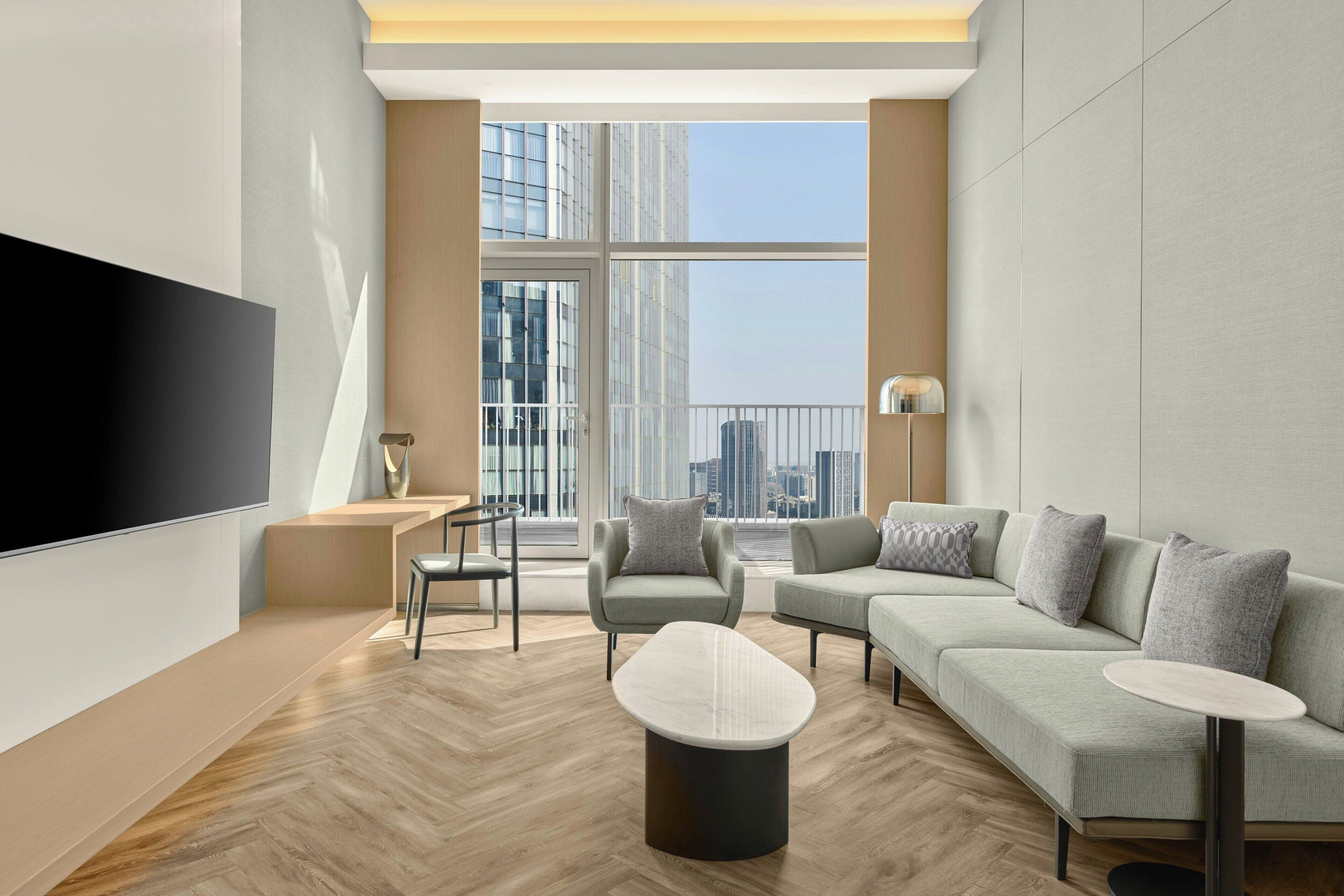 Suite, 1 cama king-size, Vista para a cidade | Sala