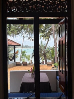 Quarto casal, sacada, vista para a praia | Parte interna