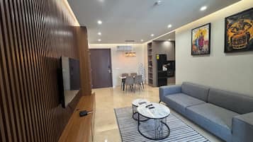 Apartamento Deluxe, varanda, Vista para a cidade | Sala de estar