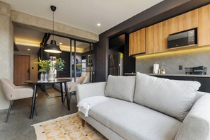 Apartamento, 1 quarto | Sala de estar