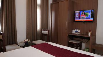 Quarto casal luxo, vista para a cidade