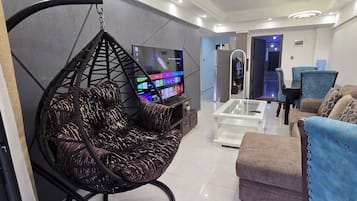 Apartamento, 1 quarto, acessível | Sala