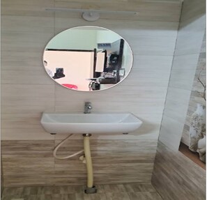 Quarto Deluxe | Casa de banho