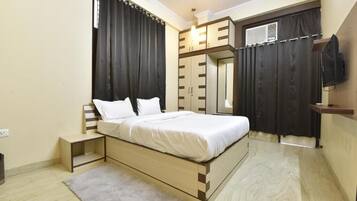 Quarto casal luxo, vista para a cidade