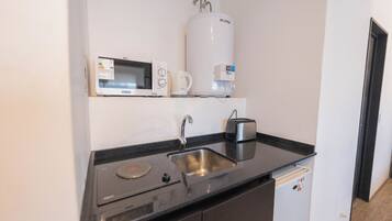 Estúdio, Vista para a cidade | Cozinha privada