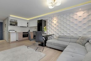 Apartamento Comfort, varanda | Sala de estar