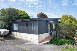 Apartamento luxo, vista para o oceano | Fachada