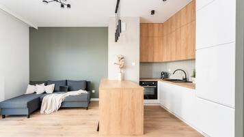 Apartamento conforto, sacada, vista para a cidade | Parte interna