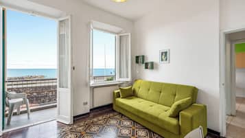 Apartamento família, 3 quartos, sacada, de frente para o mar (Amiadò) | Área de estar