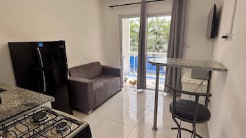 Apartamento em Condomínio Fechado, 1 quarto, pátio | Interior