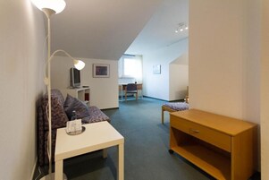 Quarto Individual Standard | Sala de estar