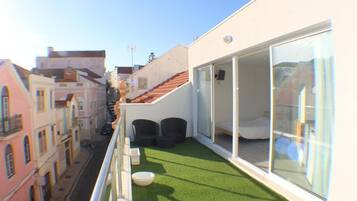 Suite, varanda, Vista para a cidade | Terrenos do alojamento