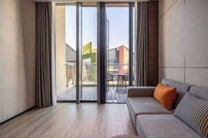 Quarto Duplo de Luxo | Sala de estar