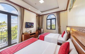 Quarto Quádruplo Familiar, varanda, vista para o jardim | Vista do alojamento