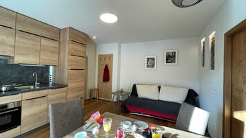 Apartamento Comfort, vista para a montanha | Interior