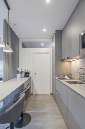 Estúdio Comfort, Vista para a cidade | Cozinha privada