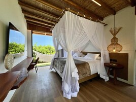 Bungalow de Luxo, lanai (alpendre havaiano), vista para o jardim | Cofre no quarto, cortinas/cortinados opacos, Wi-fi grátis 