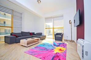 Apartamento família | Área de estar