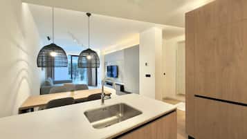 Apartamento Deluxe, pátio, vista para o jardim | Interior