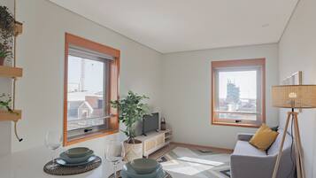 Apartamento, 1 cama queen-size e sofá-cama | Sala de estar