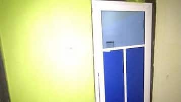 Suíte, sacada, vista para a cidade | Parte interna