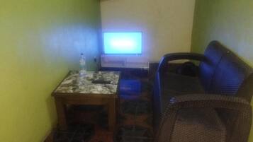 Suíte, sacada, vista para a cidade | Parte interna