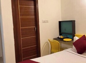 Quarto casal luxo, vista para a cidade | Área de estar