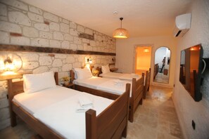 Quarto família, várias camas