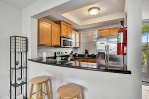 Casa geminada clássica, 2 quartos, sacada | Cozinha privada | Geladeira grande, micro-ondas, fogão, cooktop