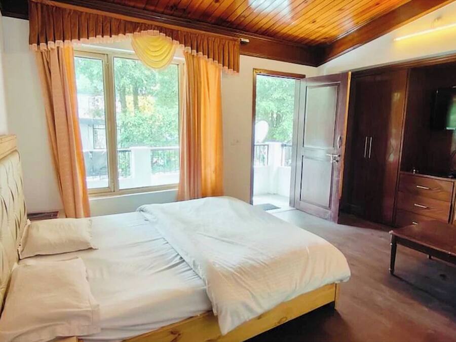 Quarto casal família | Vista do quarto