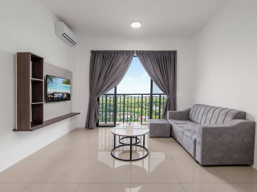 Apartamento superior, 4 quartos, sacada, vista para a cidade | Área de estar