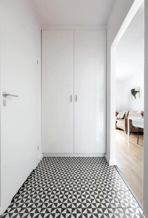 Apartamento, sacada, vista para o jardim | Parte interna