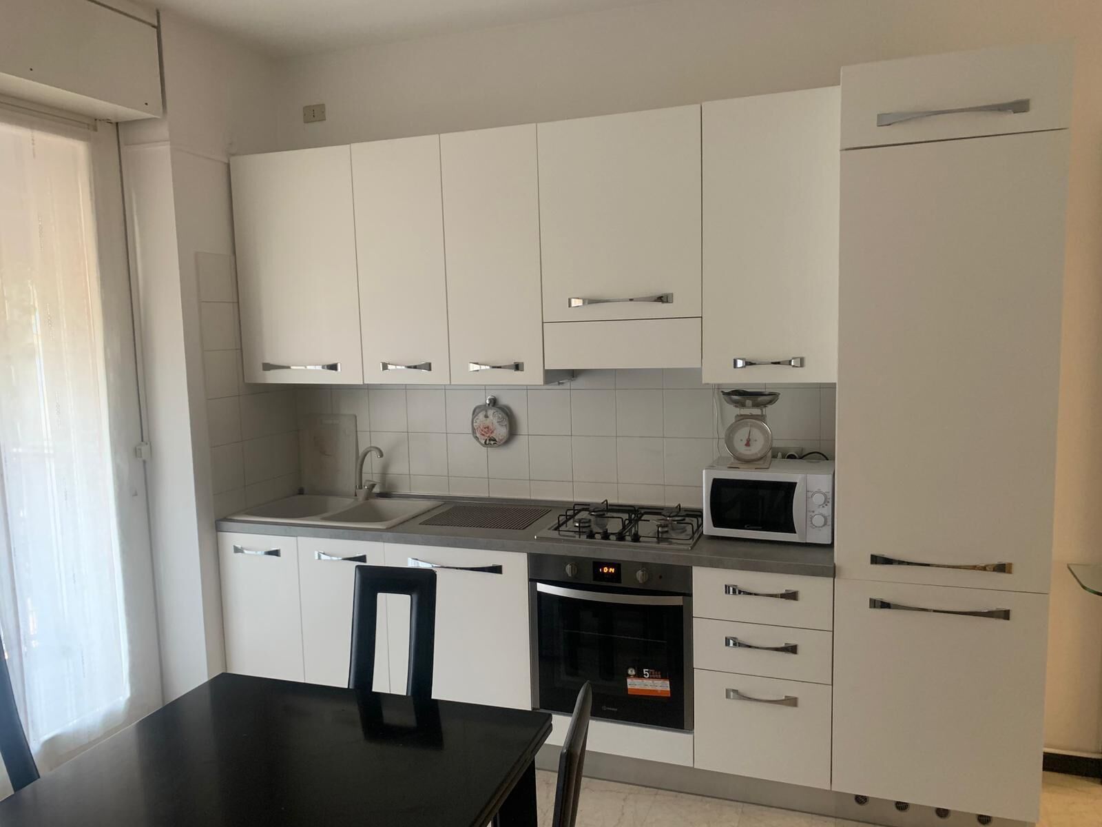 Apartamento conforto, sacada, vista para a cidade | Cozinha privada
