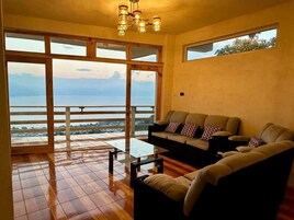 Apartamento Comfort, varanda, vista para a lagoa | Sala de estar